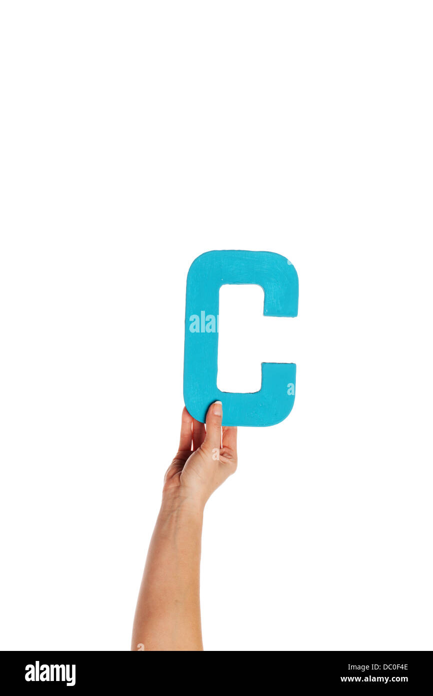 hand holding up the letter C from the bottom Stock Photo - Alamy