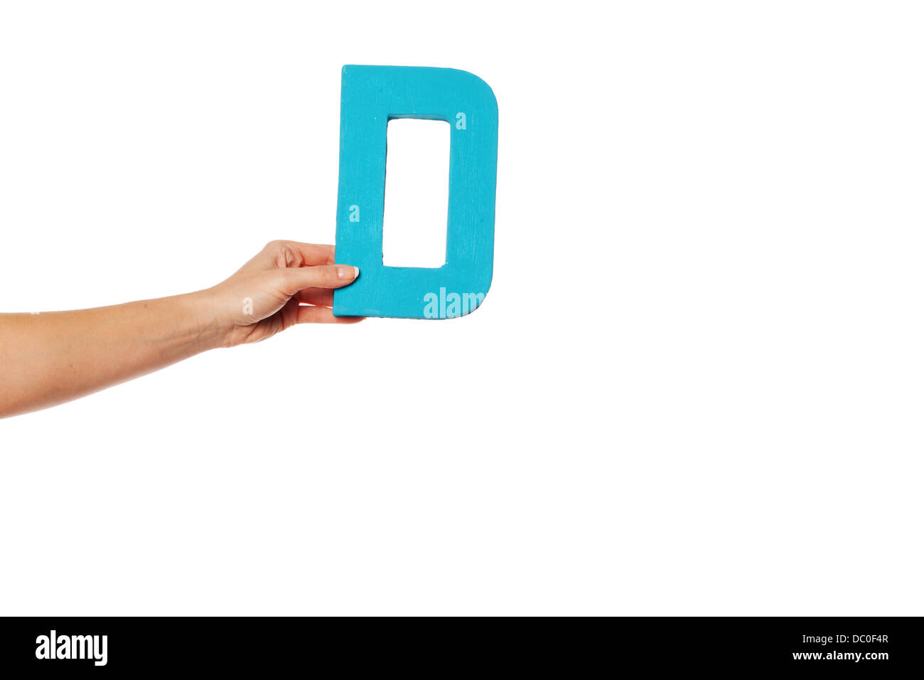hand holding up the letter D from the left Stock Photo - Alamy