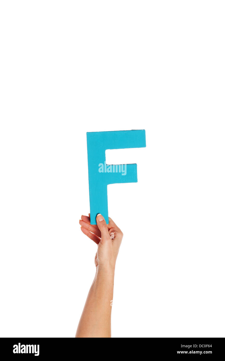 hand holding up the letter F from the bottom Stock Photo - Alamy