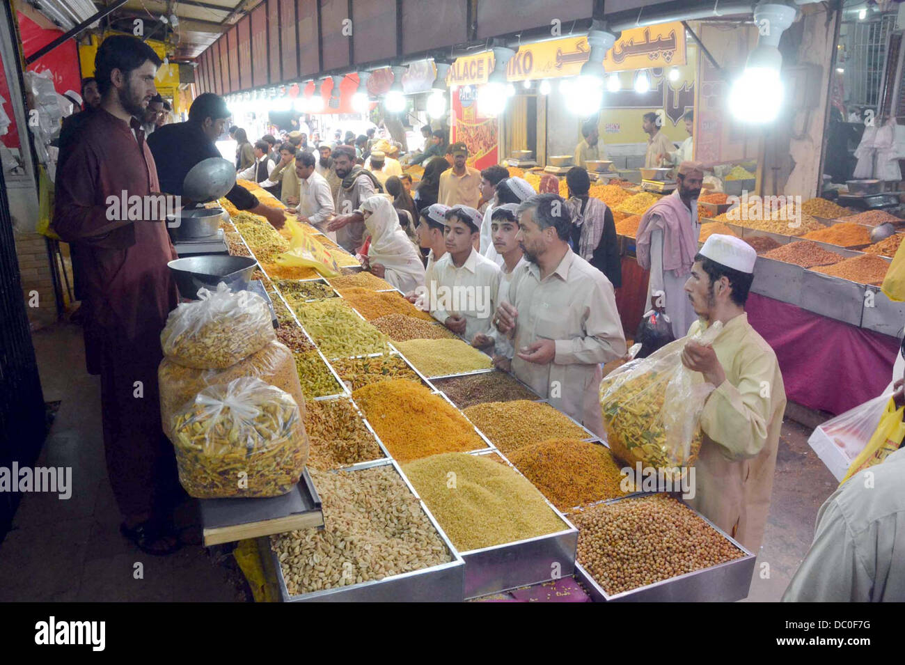 People busy in Eid shopping at market ahead of Eid- ul-Fitar during the ...