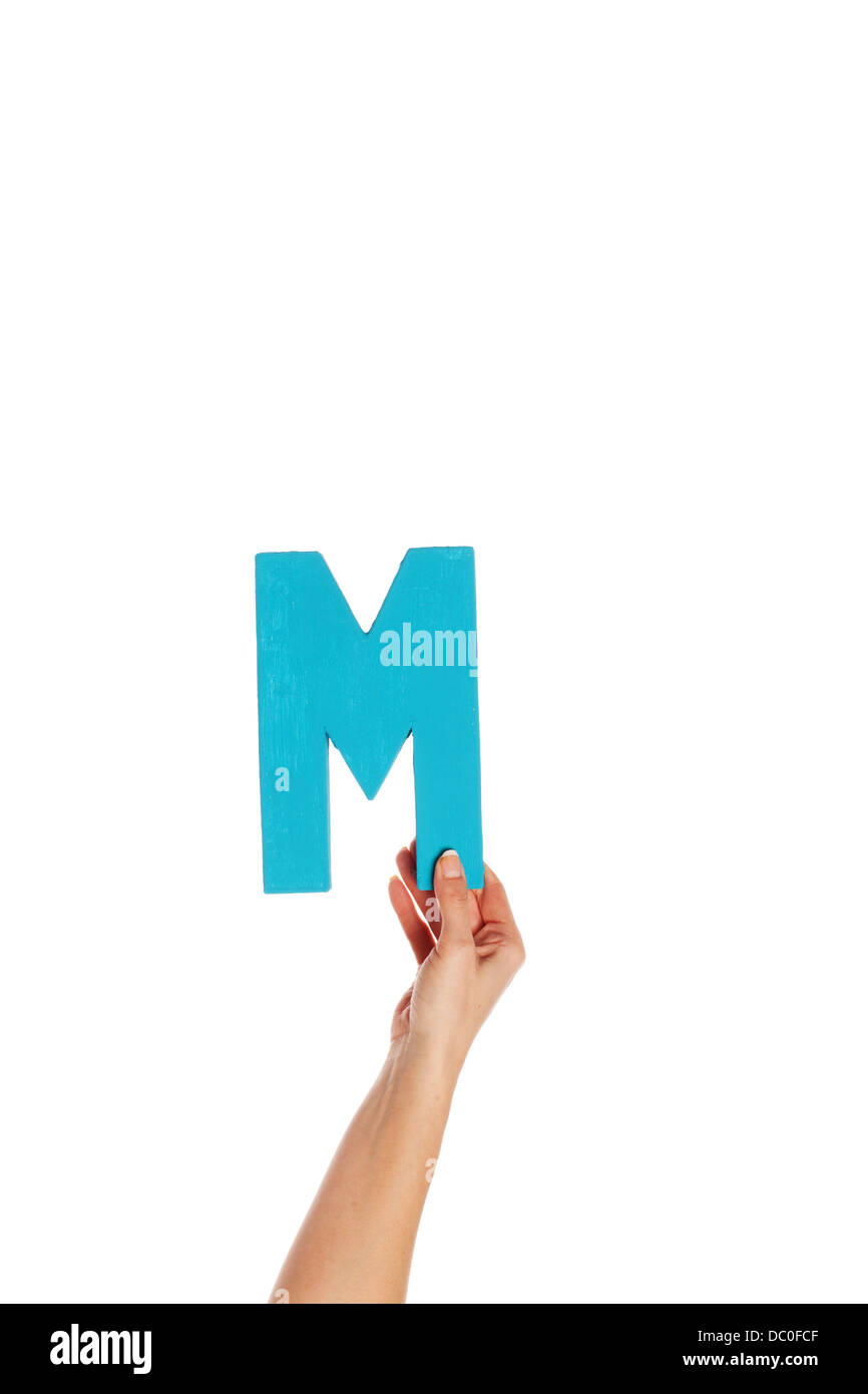 hand holding up the letter M from the bottom Stock Photo - Alamy