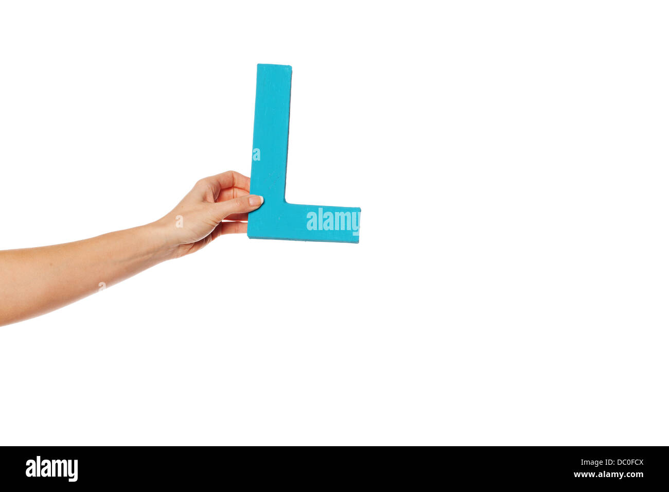 hand holding up the letter L from the left Stock Photo - Alamy