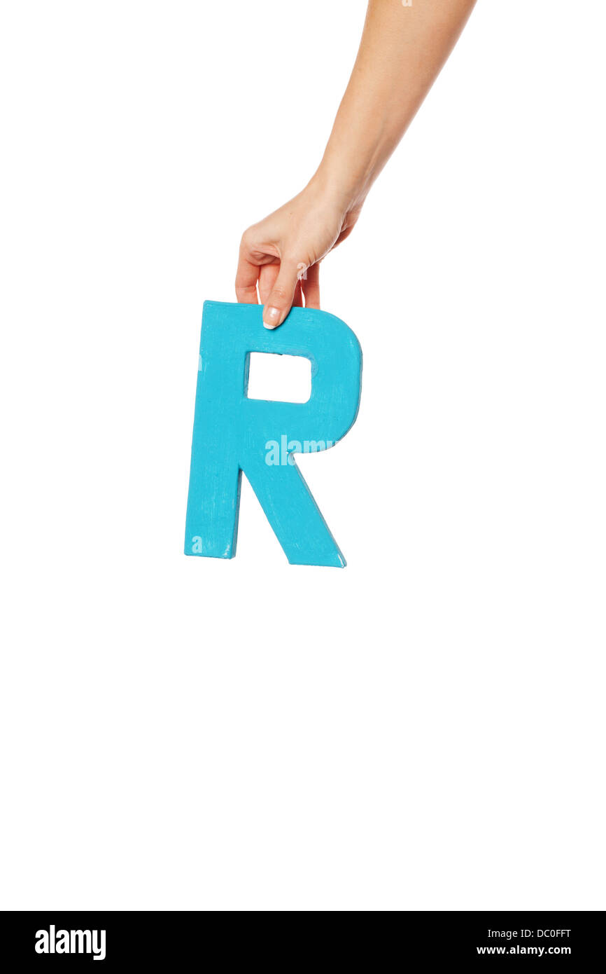 hand holding up the letter R from the top Stock Photo - Alamy