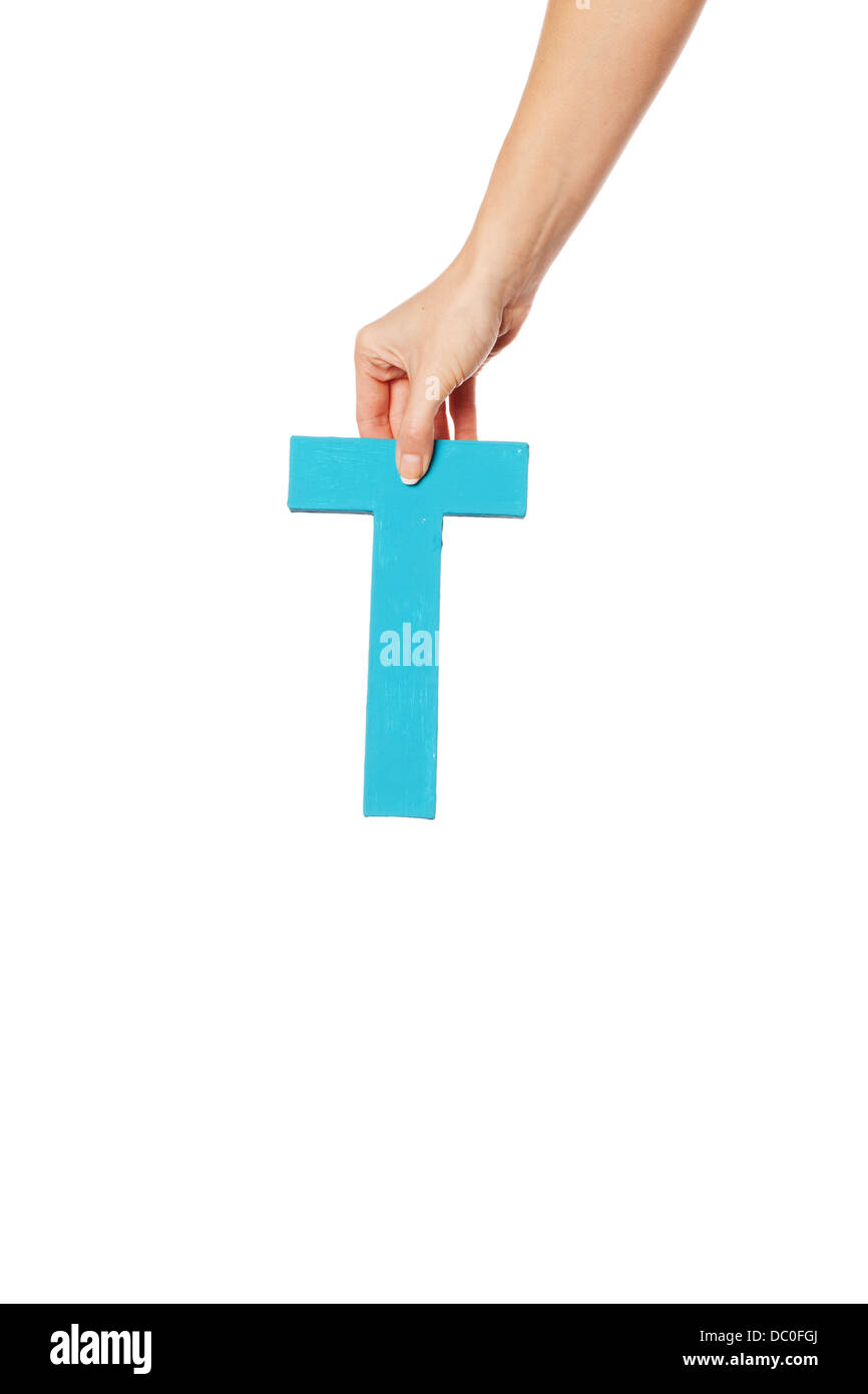 hand holding up the letter T from the top Stock Photo - Alamy
