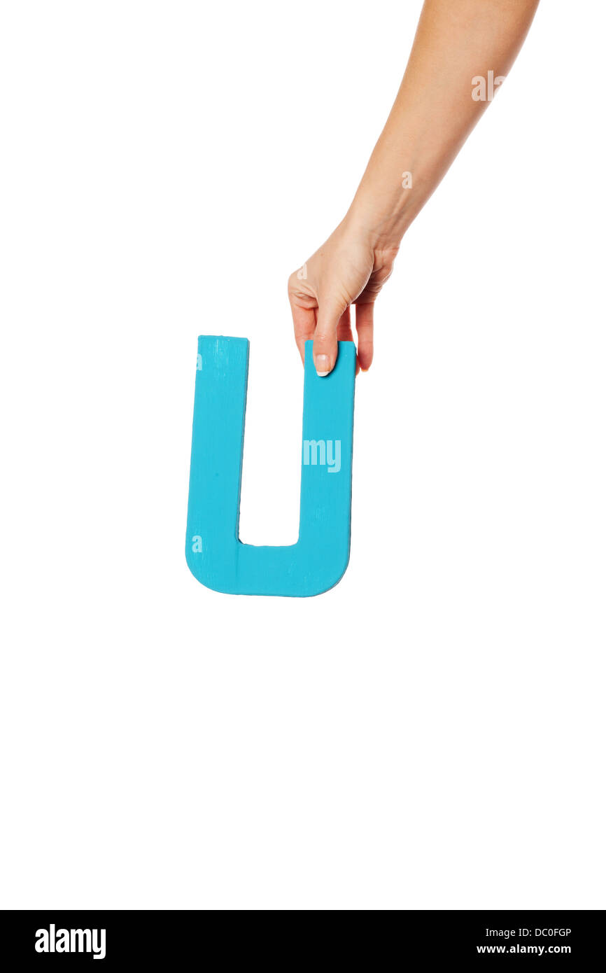 hand holding up the letter U from the top Stock Photo - Alamy