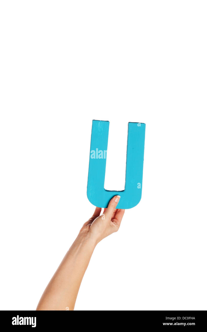 hand holding up the letter U from the bottom Stock Photo - Alamy