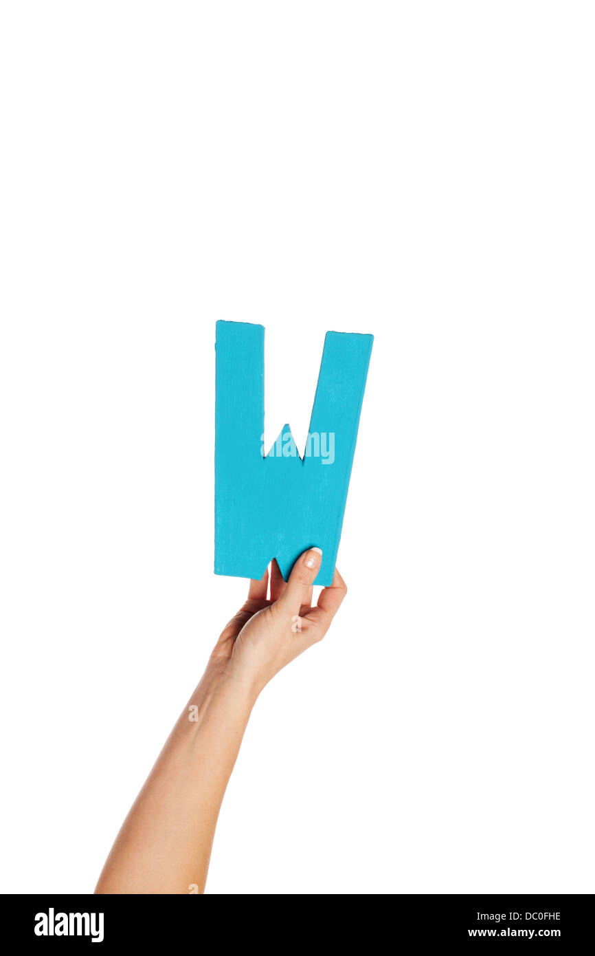 hand holding up the letter W from the bottom Stock Photo - Alamy