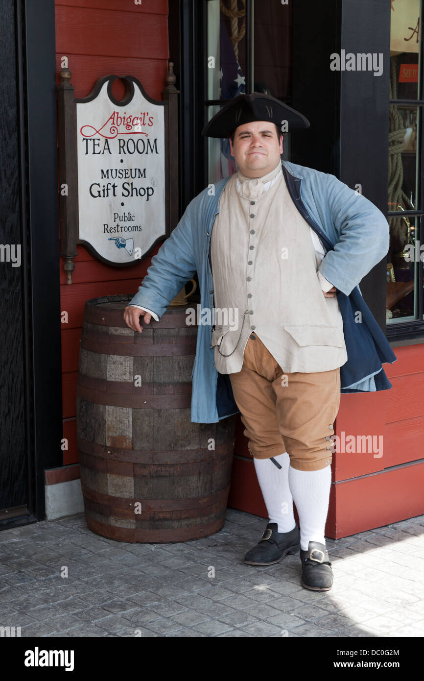Character in period dress, at the entrance to the Boston Tea Party ...