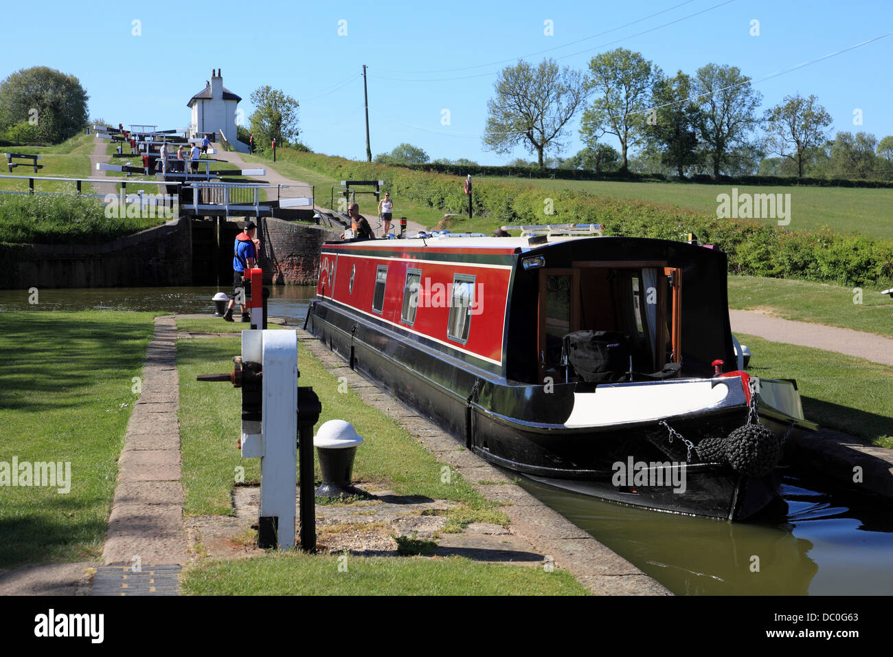 A narrowboat descending Foxton Locks, on the Grand Union Canal, the ...