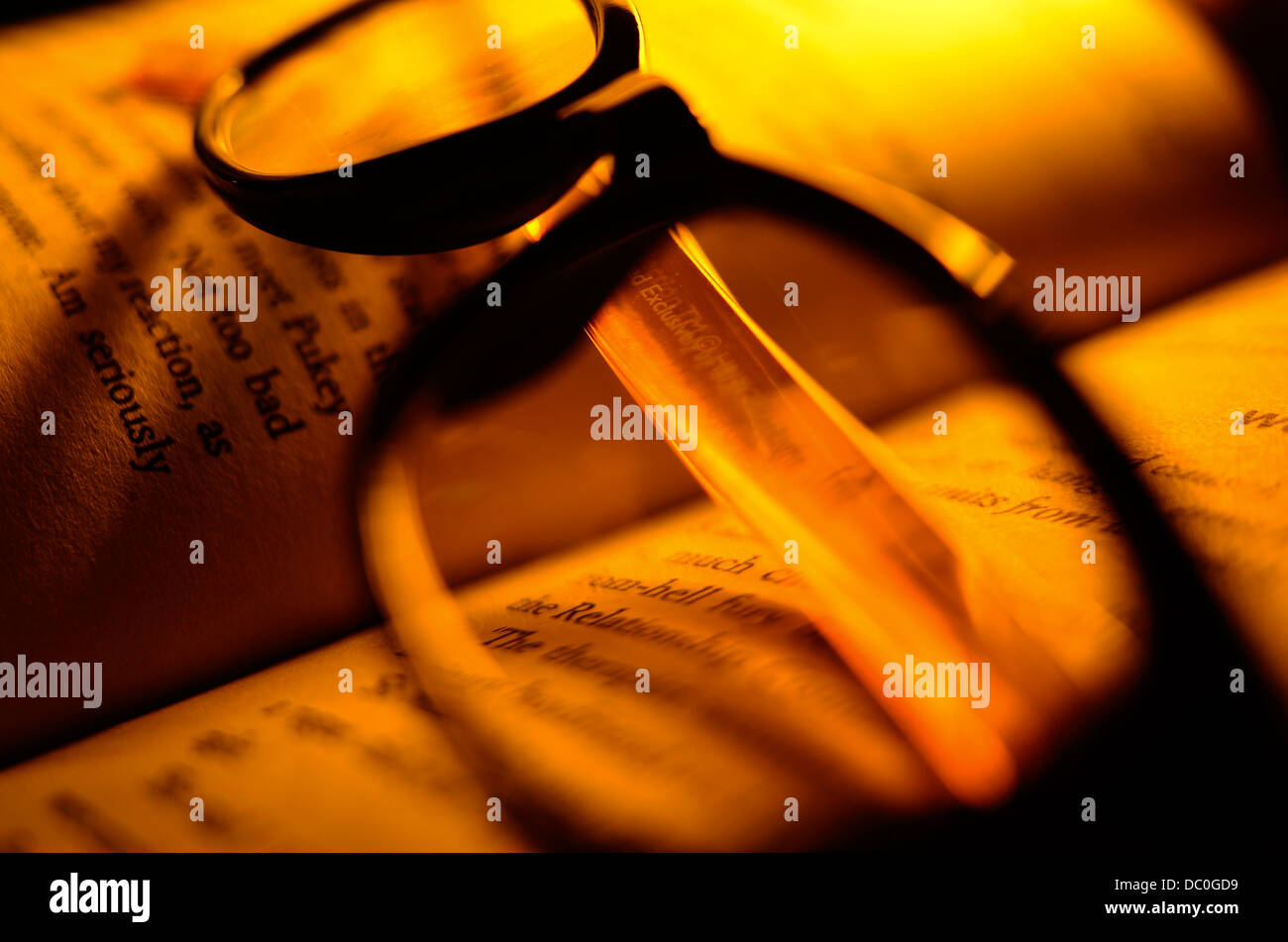 Spectacles on book hi-res stock photography and images - Alamy