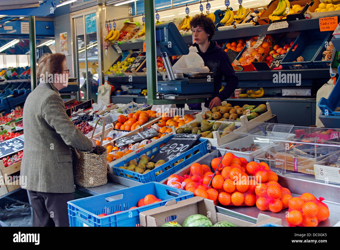 Woman buying fruit open fruit vegetable market Ghent Belgium Stock ...