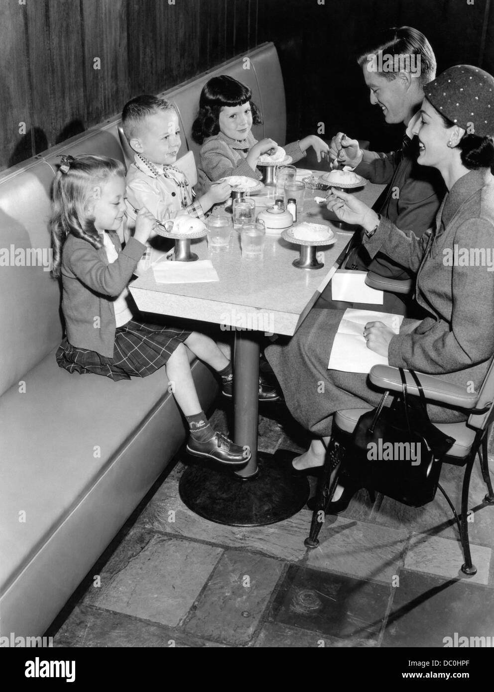 Man clothes family Black and White Stock Photos & Images - Alamy