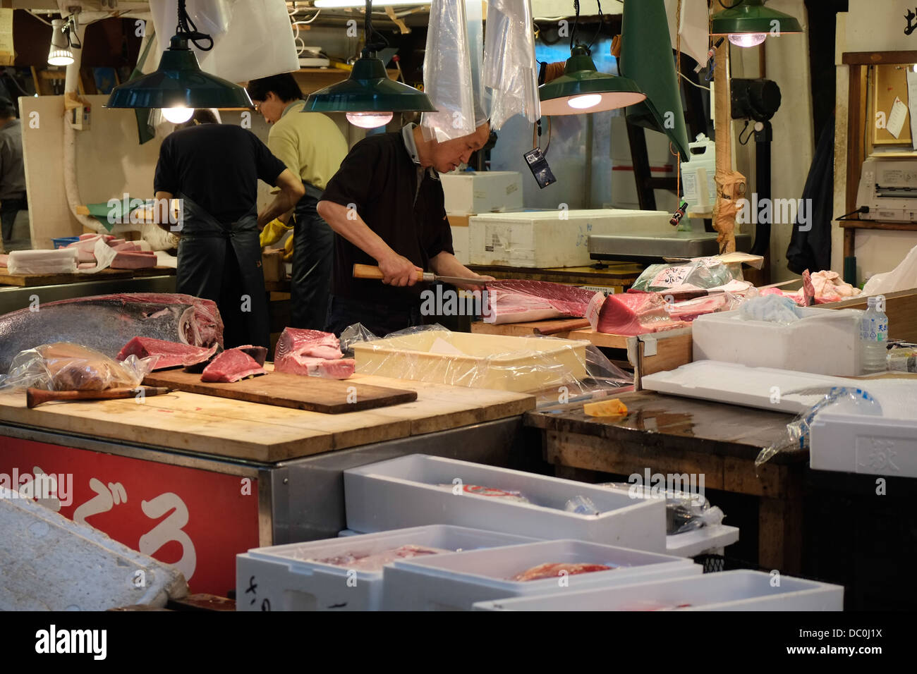 Tuna vendors at Tsukiji fish market, Tokyo Japan Stock Photo - Alamy