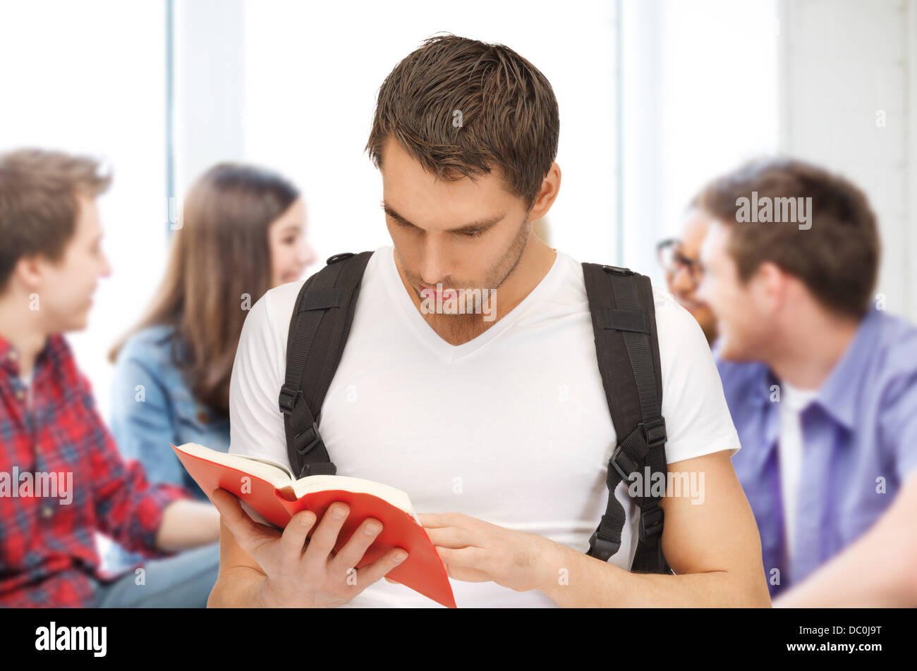 student reading book at school Stock Photo - Alamy