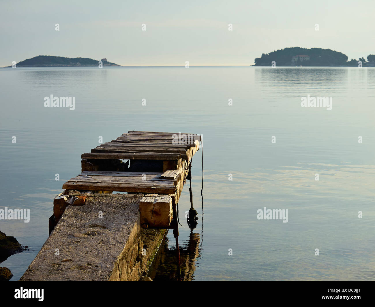 Old wooden pier in island Stock Photo - Alamy