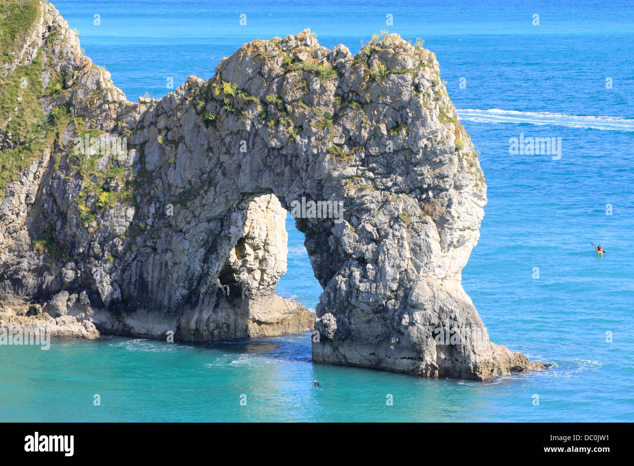 Durdle Door natural limestone arch on the Jurassic Coast near West ...