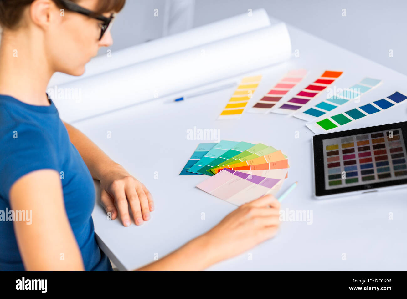 woman working with color samples for selection Stock Photo - Alamy