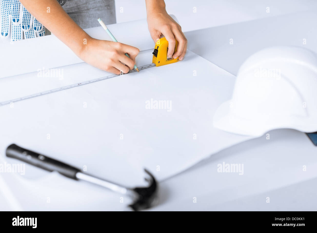 architect drawing on blueprint Stock Photo - Alamy