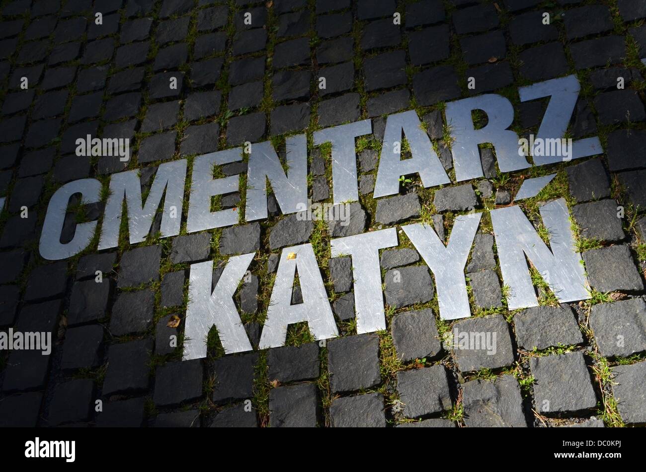 'Katyn Cemetery' is written in Polish on the floor of the Katyn ...