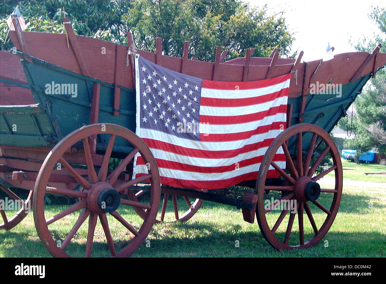 USA FLAG DRAPED ON SIDE OF CONESTOGA WAGON Stock Photo - Alamy