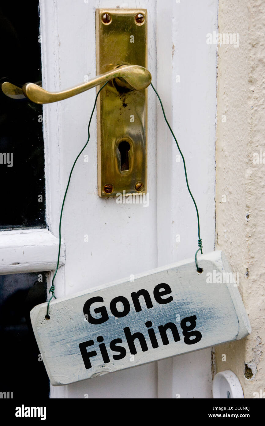 Gone Fishing Sign On Door