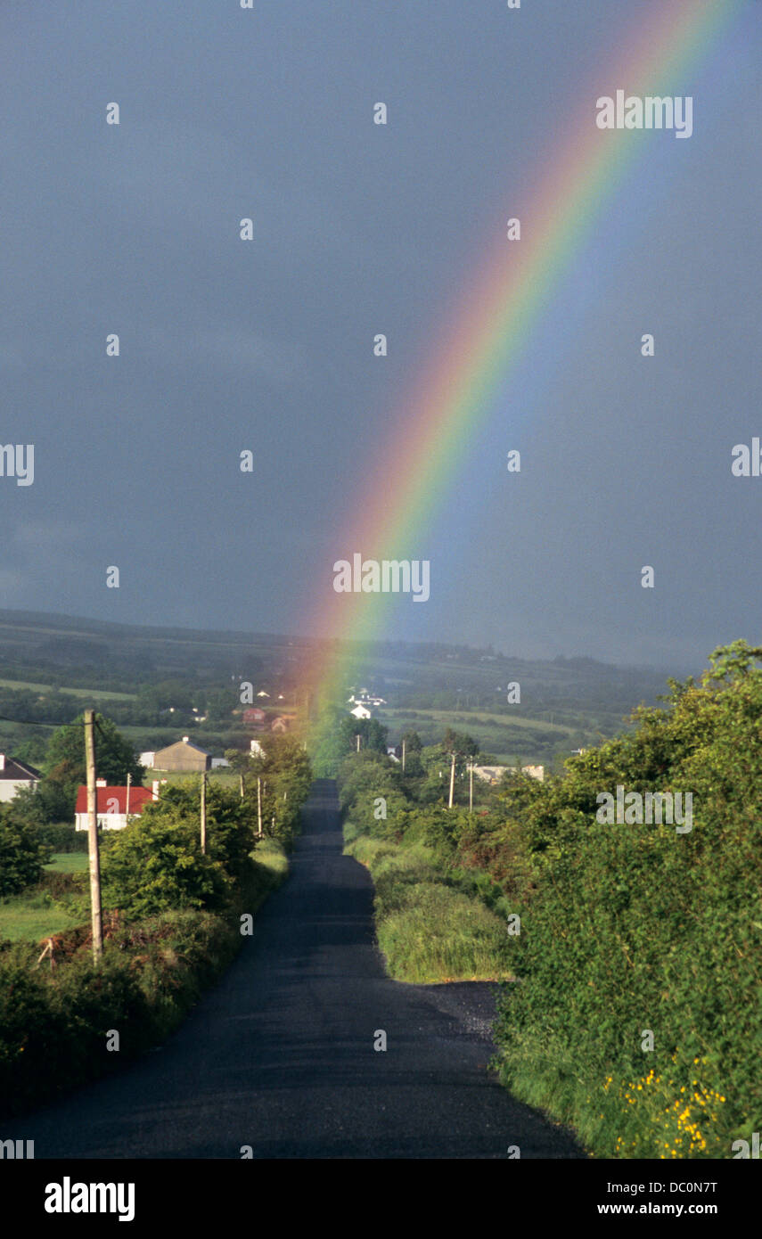 RAINBOW OVER COUNTRY LANE IRELAND Stock Photo - Alamy