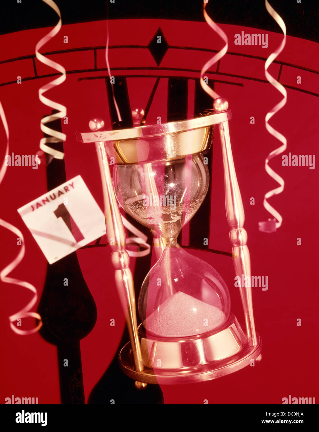 RED CLOCK AT MIDNIGHT HOURGLASS CALENDAR JANUARY 1 STREAMERS Stock ...