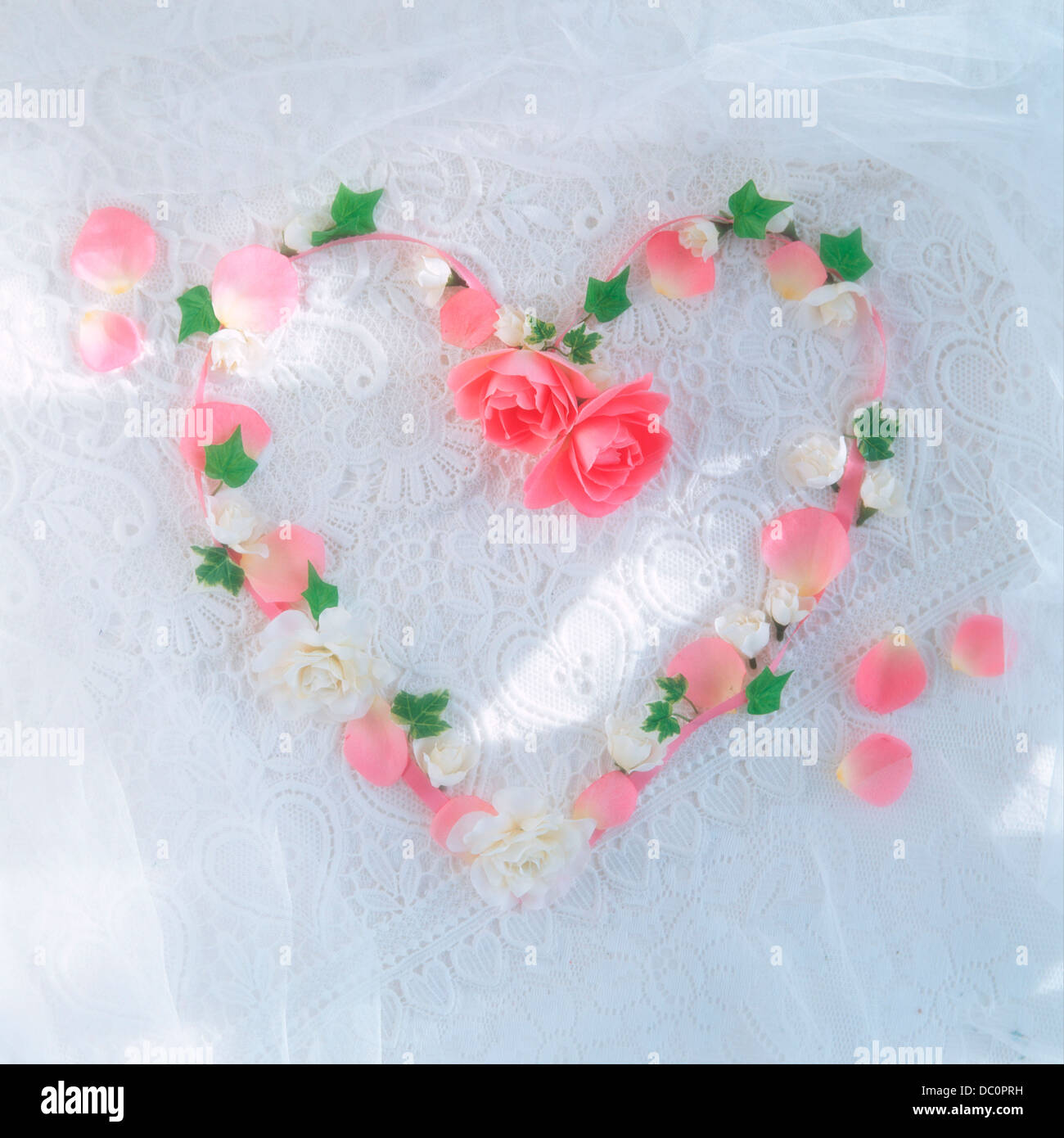 1990s VALENTINE HEART-SHAPED FLOWER WREATH ON WHITE LACE Stock Photo ...