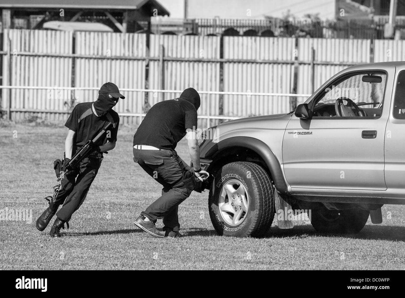 Two terrorist in action Stock Photo - Alamy