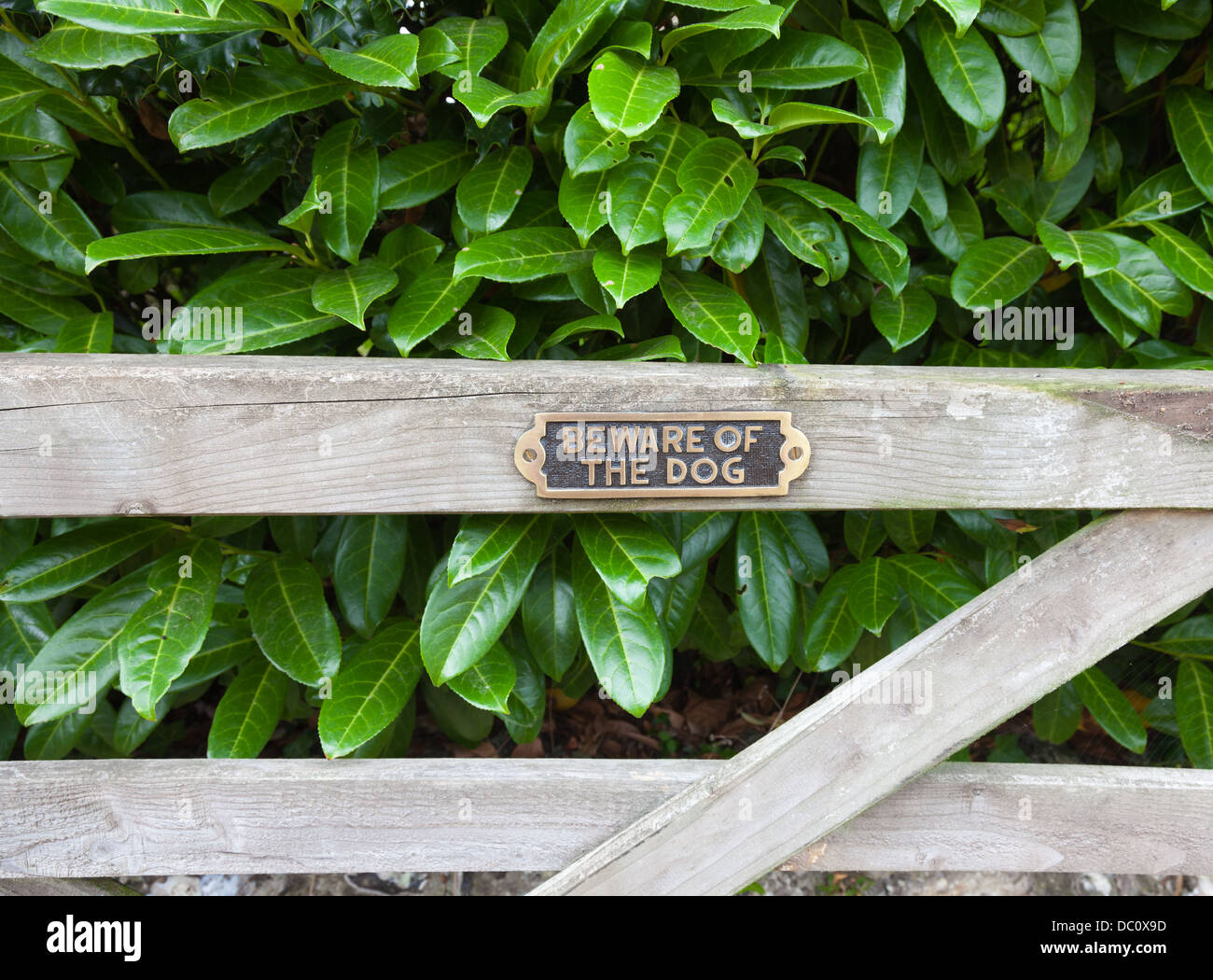 Wooden sign on bush hi-res stock photography and images - Alamy