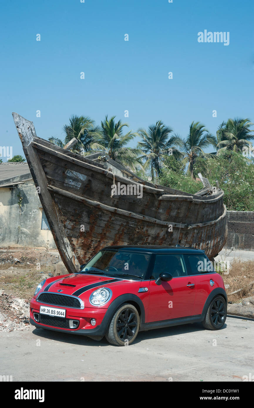 BMW Mini Cooper parked in front of an abandoned fishing vessel, Nani ...