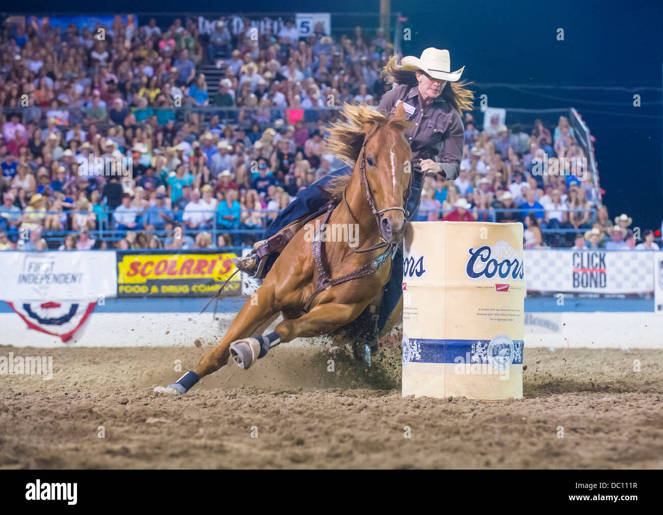 Cowgirl Participant in a Barrel racing competition at the Helldorado ...