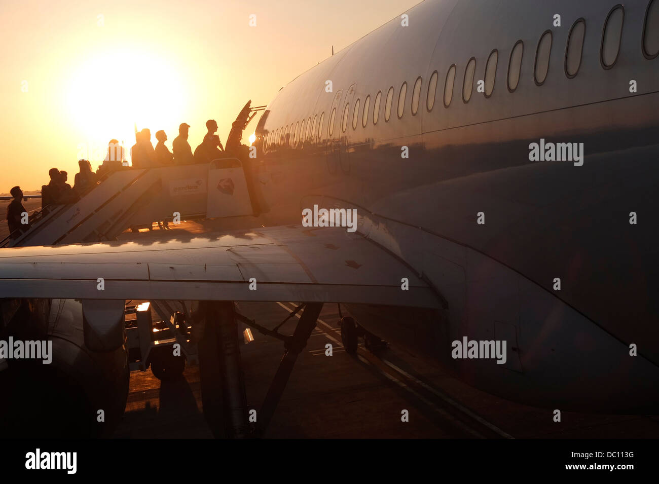 passengers boarding airplane Stock Photo - Alamy
