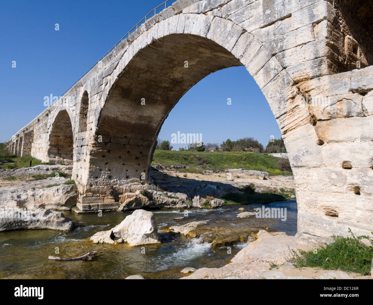 Pont Julien in Provence. The famous multi-arched stone bridge spans the ...