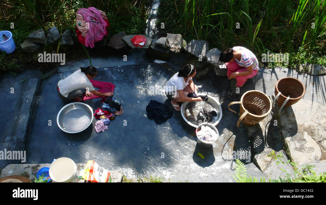 Women washing hi-res stock photography and images - Alamy