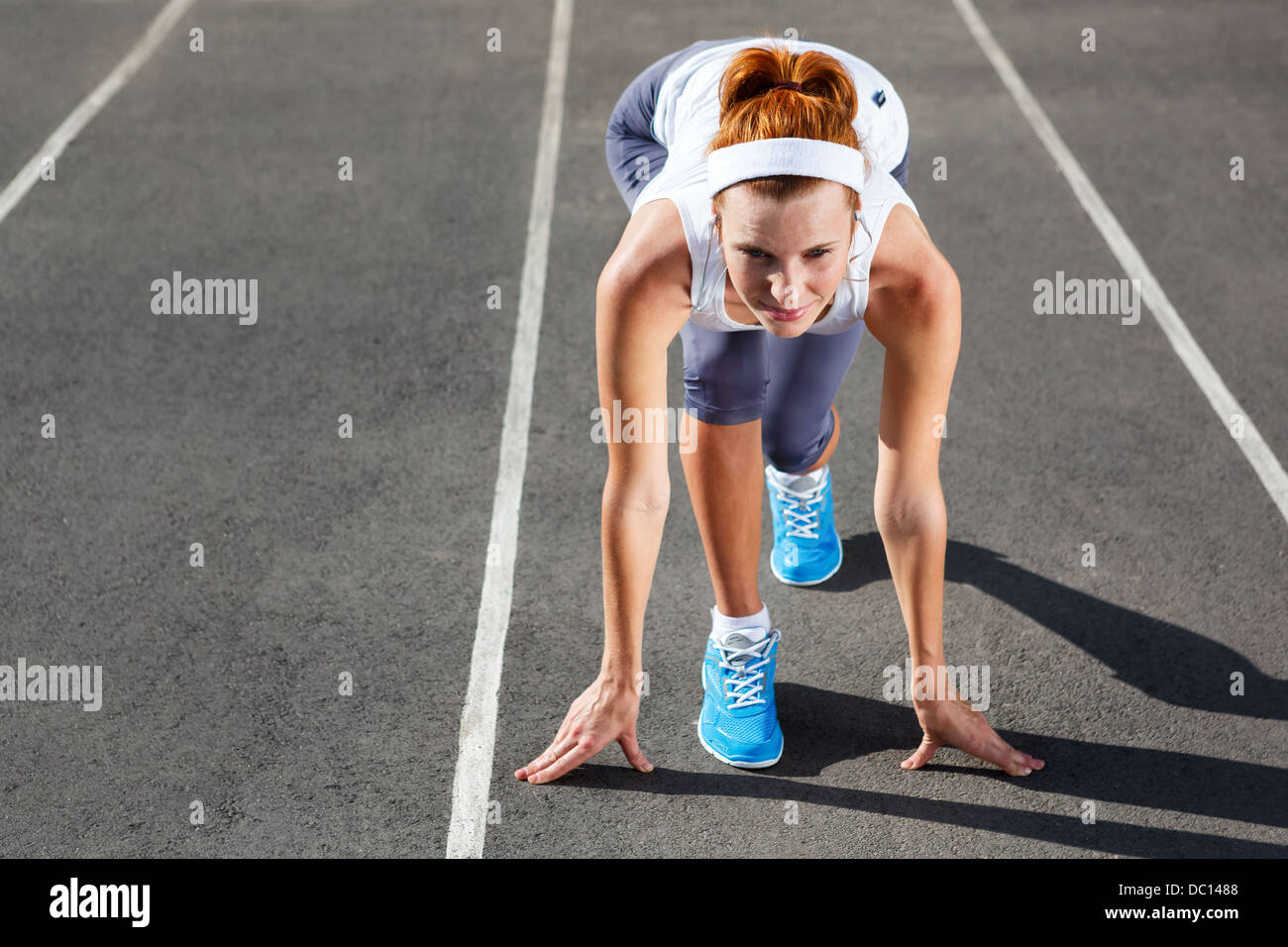 Young woman getting ready running hi-res stock photography and images ...