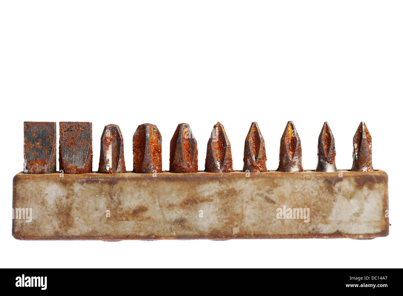Some rusty screwdriver heads isolated on white Stock Photo - Alamy