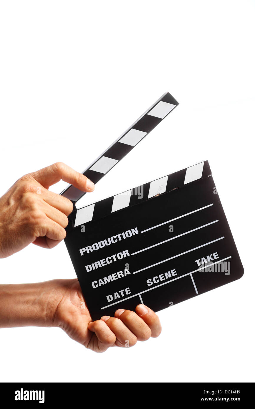 Two hands holding a cinema clap isolated on white Stock Photo - Alamy