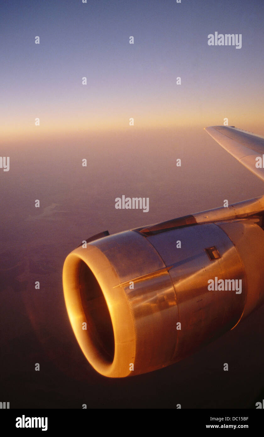 Jet engine through plane window Stock Photo - Alamy