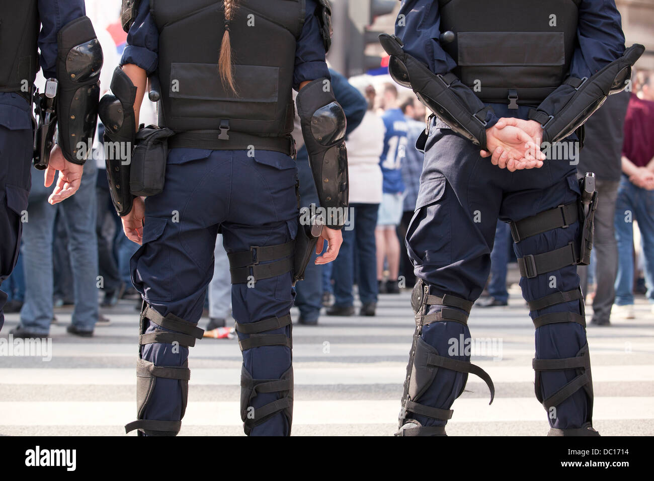 police officers with gear on duty Stock Photo - Alamy