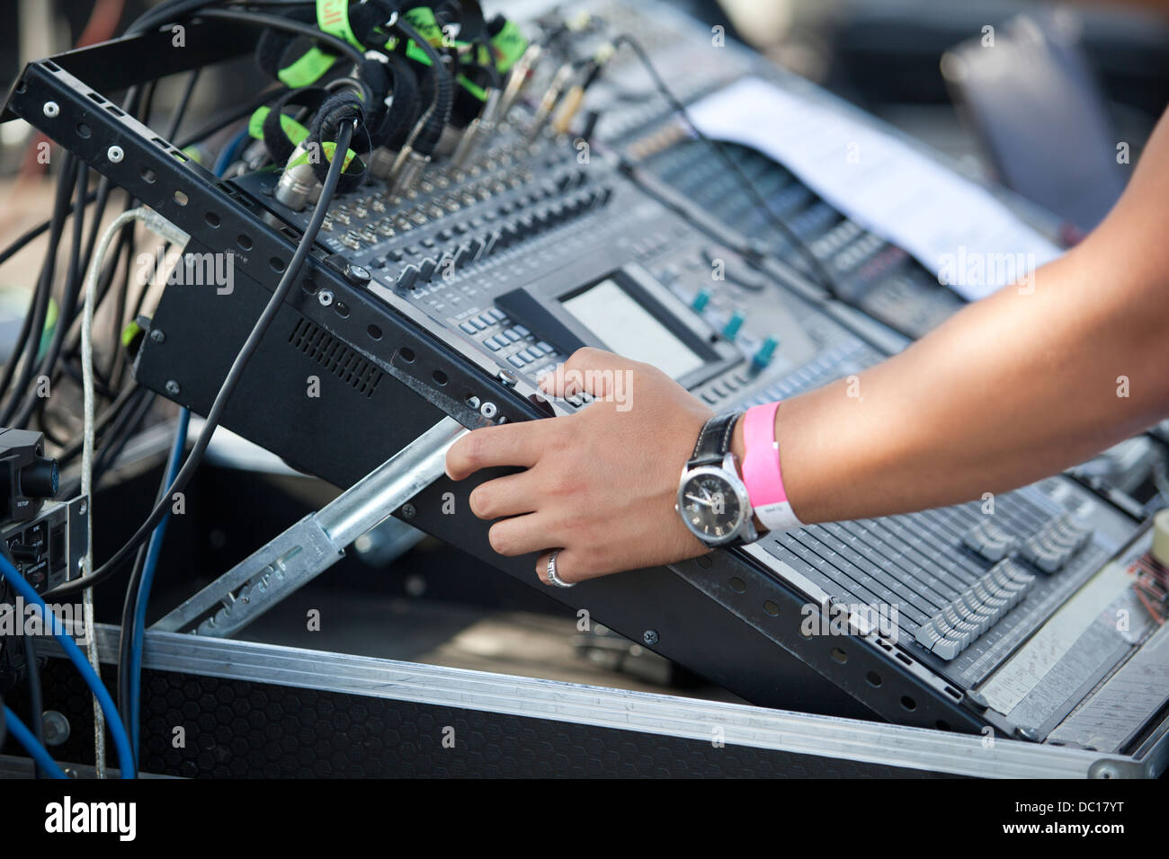 hand over music mixer Stock Photo - Alamy