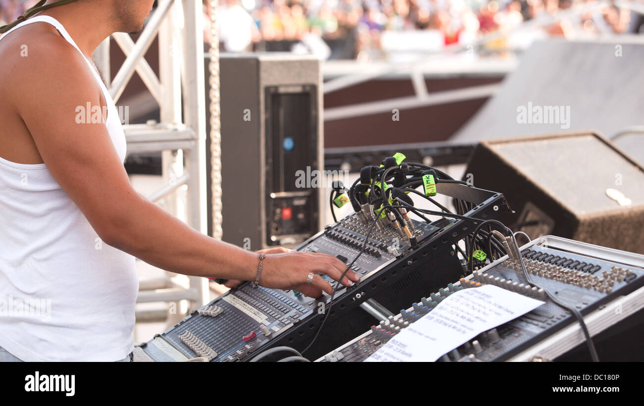 dj at the mixing board at the concert Stock Photo - Alamy