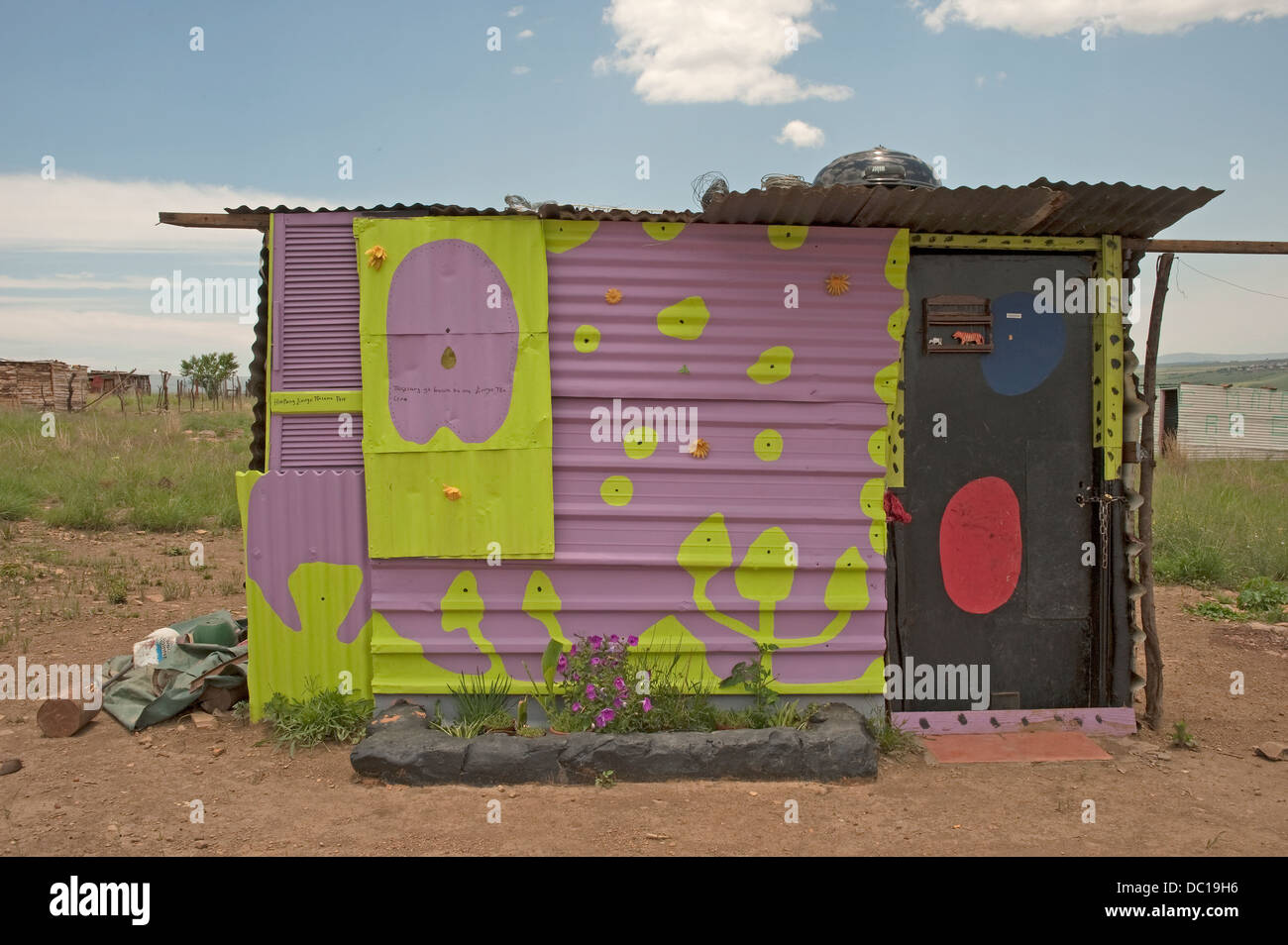 South Africa, 2011. Lydenburg. A brightly coloured shack in an informal ...