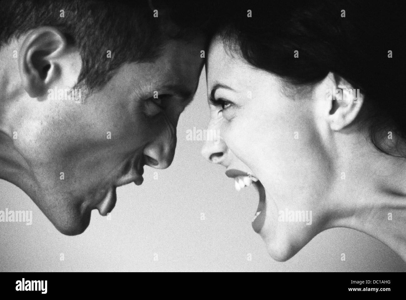 Two angry people face to face Black and White Stock Photos & Images - Alamy