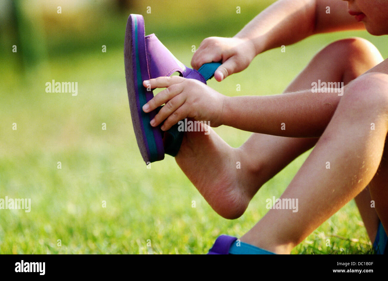 Boy wearing girl shoes hi-res stock photography and images - Alamy