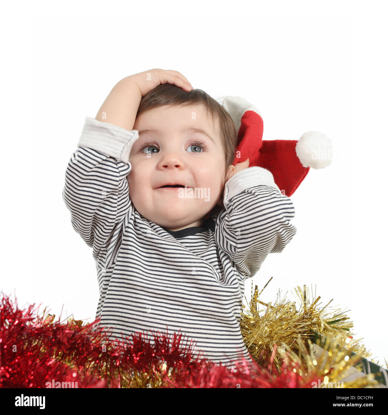 Santa claus holding babies hi-res stock photography and images - Alamy