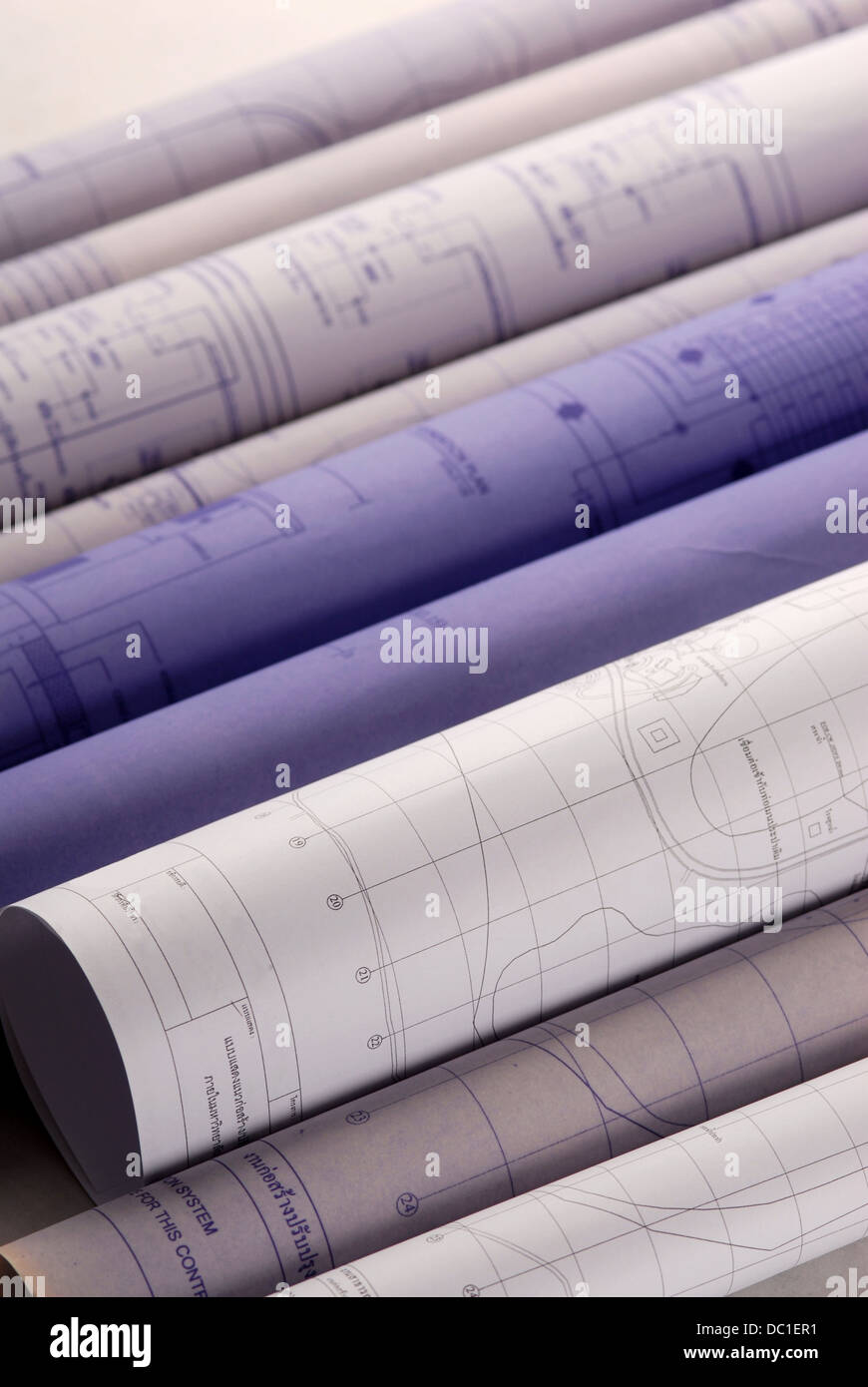 rolls of architecture blueprints, building plans Stock Photo - Alamy