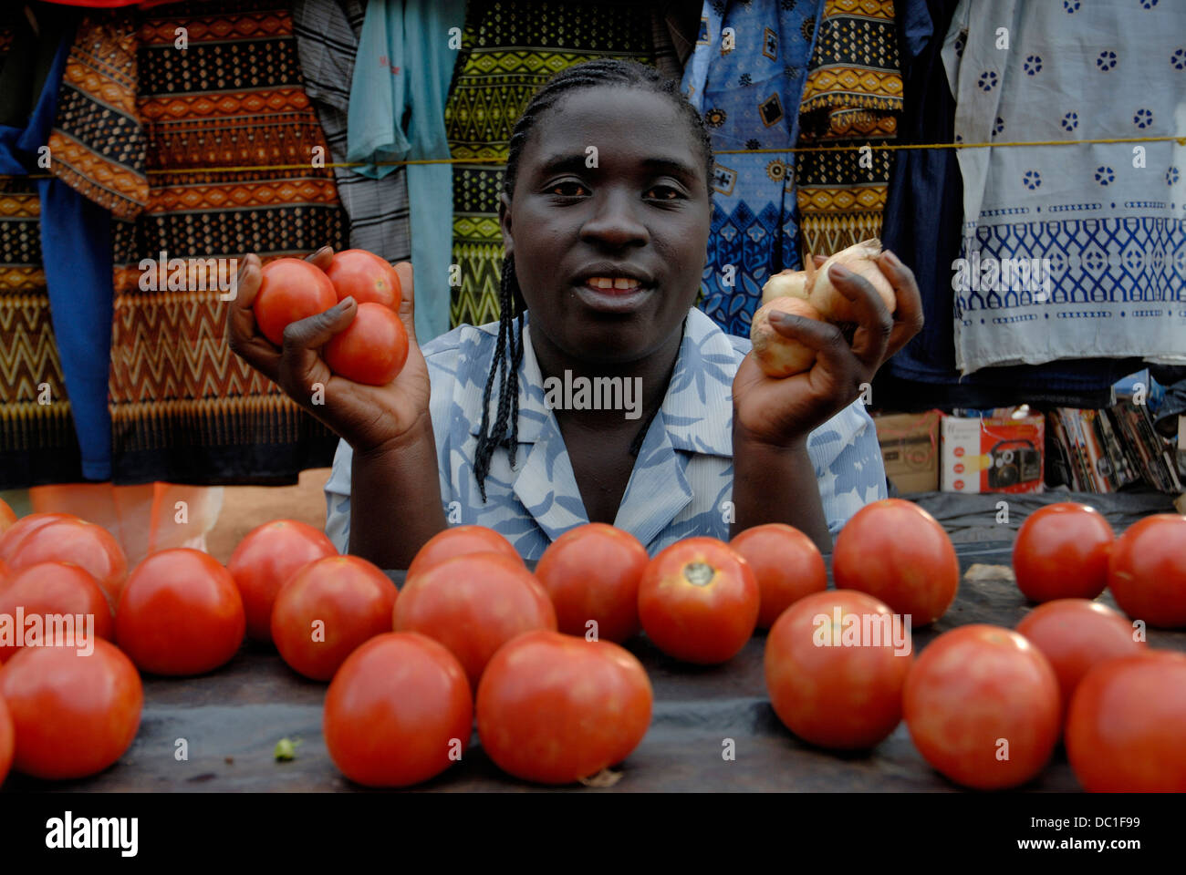 Malawi Rumphi District 24 August 2009: Jesica Mhango from COWFA Ntchena Chena village sells her ...
