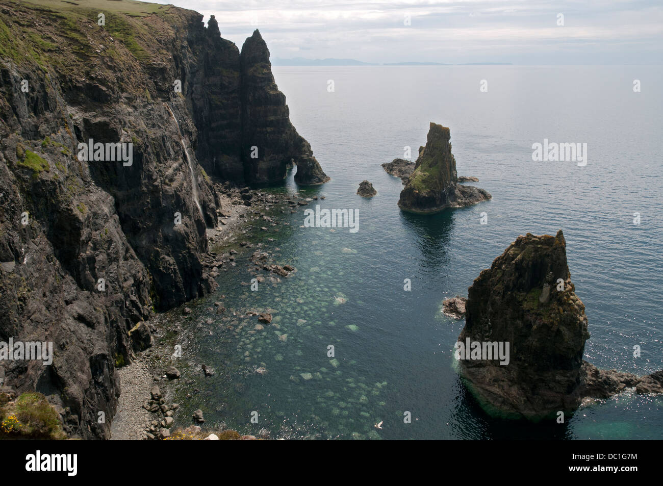 Waterfall, sea stacks, rock arch and cliff scenery on the Duirinish ...