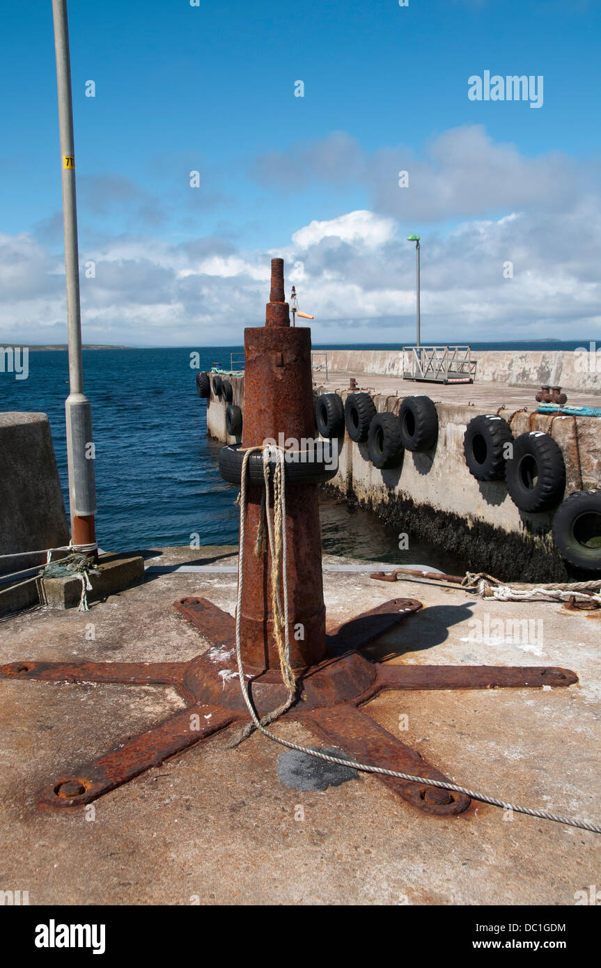 Remains of an old capstan on the harbour wall at John o'Groats ...